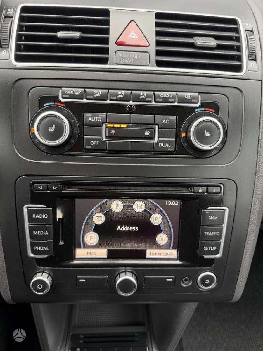Grey Volkswagen Touran 2011 in Siauliai, with an engine capacity of 1.39 L and mileage of 208 thousand km for 3690 €, photo 26 on AUTOMOTO.COM.LV