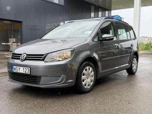 Grey Volkswagen Touran 2011 in Vilnius, with an engine capacity of 1.60 L and mileage of 207 thousand km for 4300 €, photo 3 on AUTOMOTO.COM.LV