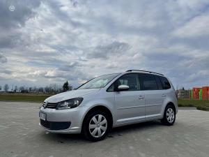 Grey Volkswagen Touran 2011 in Panevezys, with an engine capacity of 1.20 L and mileage of 305 thousand km for 2750 €, photo 3 on AUTOMOTO.COM.LV