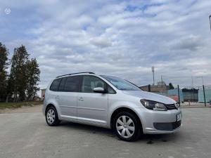 Grey Volkswagen Touran 2011 in Panevezys, with an engine capacity of 1.20 L and mileage of 305 thousand km for 2750 €, photo 5 on AUTOMOTO.COM.LV