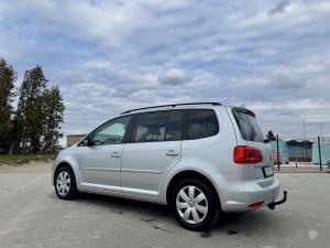 Grey Volkswagen Touran 2011 in Panevezys, with an engine capacity of 1.20 L and mileage of 305 thousand km for 2750 €, photo 9 on AUTOMOTO.COM.LV