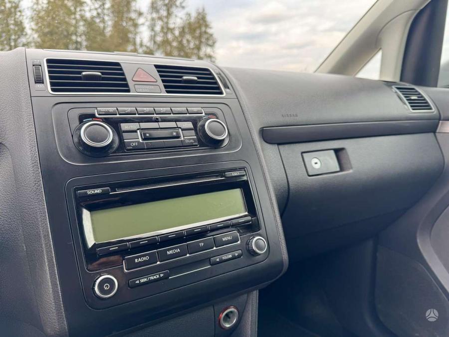 Grey Volkswagen Touran 2011 in Panevezys, with an engine capacity of 1.20 L and mileage of 305 thousand km for 2750 €, photo 12 on AUTOMOTO.COM.LV