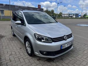 Pelēks Volkswagen Touran 2011 Kauņa, ar dzinēja tilpumu 1.60 L un nobraukumu 228 tūkst. km par 5500 €, foto  vietnē AUTOMOTO.COM.LV