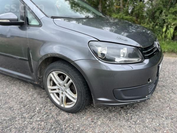 Grey Volkswagen Touran 2011 in Riga, with an engine capacity of 1.60 L and mileage of 263 thousand km for 2640 €, photo 10 on AUTOMOTO.COM.LV