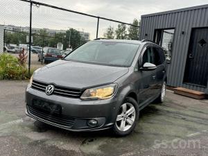 Grey Volkswagen Touran 2011 in Riga, with an engine capacity of 1.60 L and mileage of 333 thousand km for 3550 €, photo  on AUTOMOTO.COM.LV