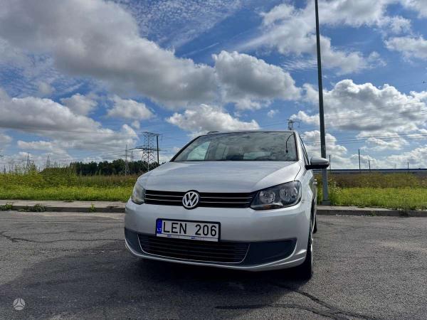 Pelēks Volkswagen Touran 2011 Panevēža, ar dzinēja tilpumu 1.20 L un nobraukumu 305 tūkst. km par 3499 €, foto 1 vietnē AUTOMOTO.COM.LV