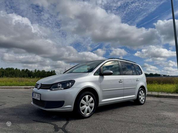 Pelēks Volkswagen Touran 2011 Panevēža, ar dzinēja tilpumu 1.20 L un nobraukumu 305 tūkst. km par 3499 €, foto 2 vietnē AUTOMOTO.COM.LV