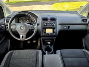 Grey Volkswagen Touran 2011 in Taurage, with an engine capacity of 1.60 L and mileage of 245 thousand km for 4800 €, photo 12 on AUTOMOTO.COM.LV