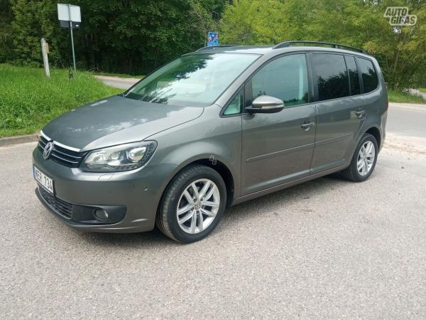 Grey Volkswagen Touran 2011 in Vilnius, with an engine capacity of 1.60 L and mileage of 310 thousand km for 4890 €, photo 7 on AUTOMOTO.COM.LV
