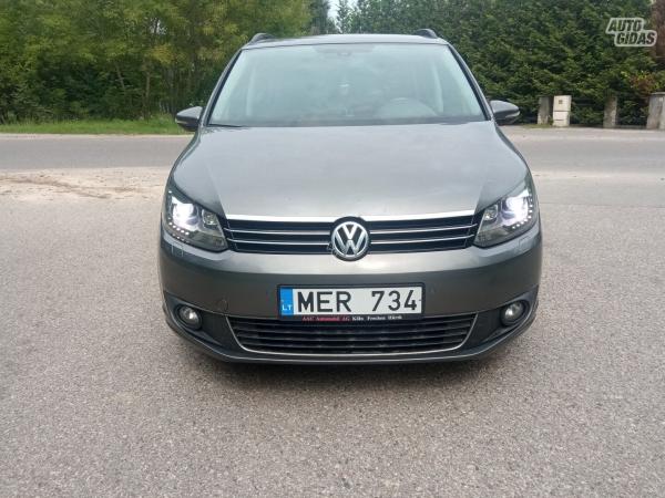 Grey Volkswagen Touran 2011 in Vilnius, with an engine capacity of 1.60 L and mileage of 310 thousand km for 4890 €, photo 8 on AUTOMOTO.COM.LV