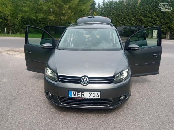Grey Volkswagen Touran 2011 in Vilnius, with an engine capacity of 1.60 L and mileage of 310 thousand km for 4890 €, photo 9 on AUTOMOTO.COM.LV