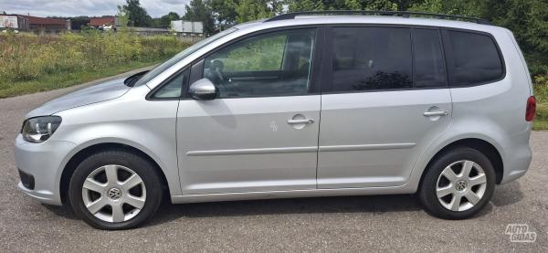Grey Volkswagen Touran 2011 in Marijampole, with an engine capacity of 2.00 L and mileage of 295 thousand km for 5200 €, photo 7 on AUTOMOTO.COM.LV