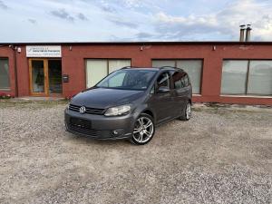 Grey Volkswagen Touran 2011 in Kaunas, with an engine capacity of 1.97 L and mileage of 410 thousand km for 3150 €, photo  on AUTOMOTO.COM.LV