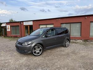 Grey Volkswagen Touran 2011 in Kaunas, with an engine capacity of 1.97 L and mileage of 410 thousand km for 3150 €, photo 3 on AUTOMOTO.COM.LV
