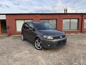 Grey Volkswagen Touran 2011 in Kaunas, with an engine capacity of 1.97 L and mileage of 410 thousand km for 3150 €, photo 4 on AUTOMOTO.COM.LV