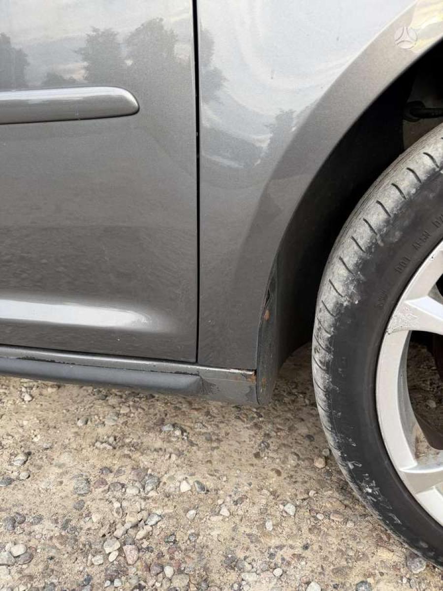 Grey Volkswagen Touran 2011 in Kaunas, with an engine capacity of 1.97 L and mileage of 410 thousand km for 3150 €, photo 25 on AUTOMOTO.COM.LV