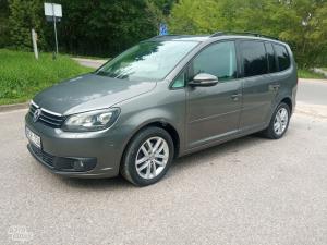 Grey Volkswagen Touran 2011 in Vilnius, with an engine capacity of 1.60 L and mileage of 310 thousand km for 4890 €, photo  on AUTOMOTO.COM.LV