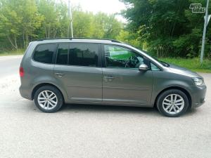 Grey Volkswagen Touran 2011 in Vilnius, with an engine capacity of 1.60 L and mileage of 310 thousand km for 4890 €, photo 4 on AUTOMOTO.COM.LV