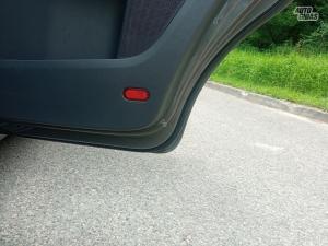 Grey Volkswagen Touran 2011 in Vilnius, with an engine capacity of 1.60 L and mileage of 310 thousand km for 4890 €, photo 14 on AUTOMOTO.COM.LV