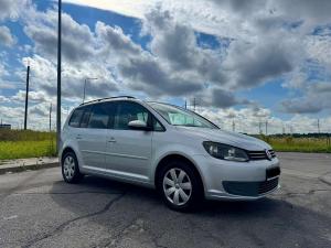 Grey Volkswagen Touran 2011 in Panevezys, with an engine capacity of 1.20 L and mileage of 305 thousand km for 2499 €, photo 5 on AUTOMOTO.COM.LV