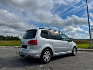 Grey Volkswagen Touran 2011 in Panevezys, with an engine capacity of 1.20 L and mileage of 305 thousand km for 2499 €, photo 6 on AUTOMOTO.COM.LV