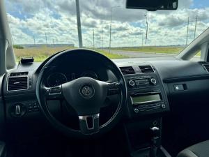 Grey Volkswagen Touran 2011 in Panevezys, with an engine capacity of 1.20 L and mileage of 305 thousand km for 2499 €, photo 10 on AUTOMOTO.COM.LV