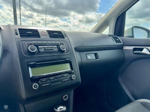 Grey Volkswagen Touran 2011 in Panevezys, with an engine capacity of 1.20 L and mileage of 305 thousand km for 2499 €, photo 12 on AUTOMOTO.COM.LV
