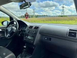Grey Volkswagen Touran 2011 in Panevezys, with an engine capacity of 1.20 L and mileage of 305 thousand km for 2499 €, photo 13 on AUTOMOTO.COM.LV
