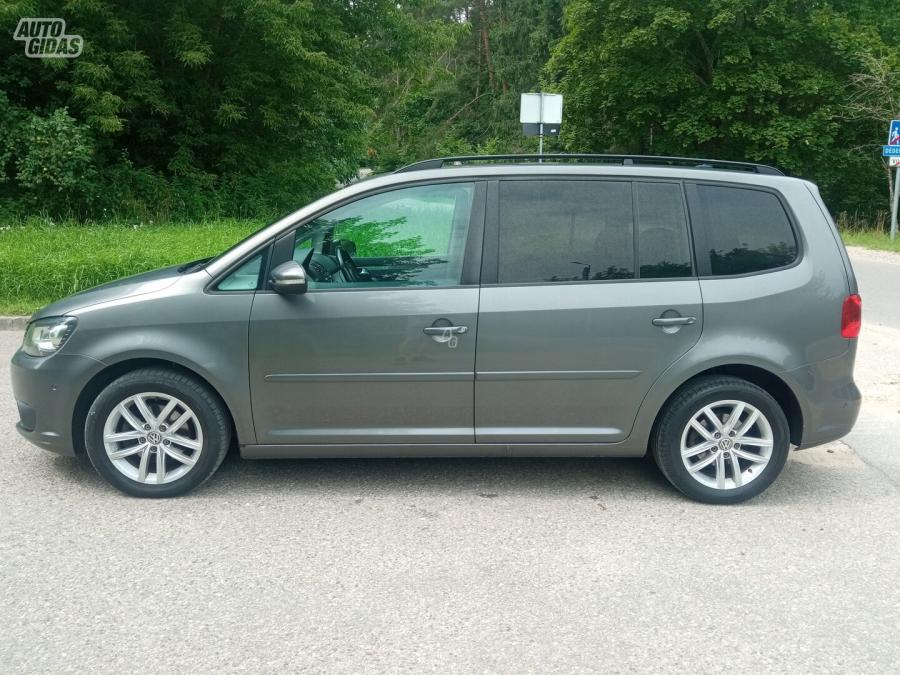 Grey Volkswagen Touran 2011 in Vilnius, with an engine capacity of 1.60 L and mileage of 310 thousand km for 4890 €, photo 8 on AUTOMOTO.COM.LV