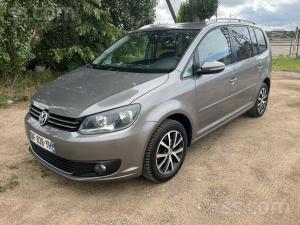 Grey Volkswagen Touran 2011 in Riga, with an engine capacity of 2.00 L and mileage of 225 thousand km for 6550 €, photo  on AUTOMOTO.COM.LV
