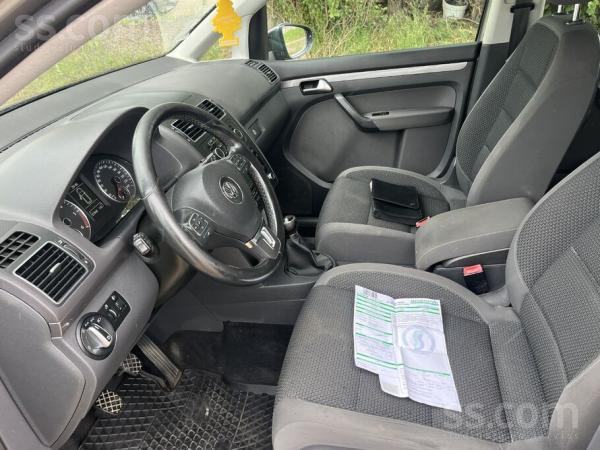 Grey Volkswagen Touran 2011 in Riga, with an engine capacity of 2.00 L and mileage of 225 thousand km for 6550 €, photo 6 on AUTOMOTO.COM.LV