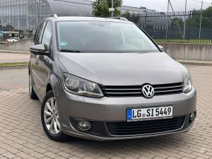Grey Volkswagen Touran 2011 in Jonava, with an engine capacity of 1.97 L and mileage of 299 thousand km for 5999 €, photo  on AUTOMOTO.COM.LV