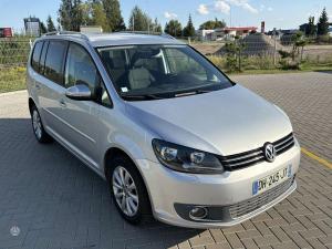 Grey Volkswagen Touran 2011 in Taurage, with an engine capacity of 1.97 L and mileage of 293 thousand km for 4950 €, photo  on AUTOMOTO.COM.LV