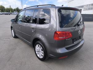 Grey Volkswagen Touran 2011 in Marijampole, with an engine capacity of 2.00 L and mileage of 107 thousand km for 7650 €, photo 6 on AUTOMOTO.COM.LV