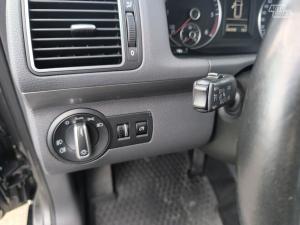 Grey Volkswagen Touran 2011 in Marijampole, with an engine capacity of 2.00 L and mileage of 107 thousand km for 7650 €, photo 11 on AUTOMOTO.COM.LV