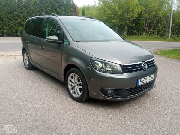 Grey Volkswagen Touran 2011 in Vilnius, with an engine capacity of 1.60 L and mileage of 310 thousand km for 4690 €, photo 1 on AUTOMOTO.COM.LV