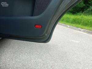 Grey Volkswagen Touran 2011 in Vilnius, with an engine capacity of 1.60 L and mileage of 310 thousand km for 4690 €, photo 23 on AUTOMOTO.COM.LV