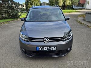 Grey Volkswagen Touran 2011 in Jekabpils, with an engine capacity of 1.60 L and mileage of 280 thousand km for 6490 €, photo 4 on AUTOMOTO.COM.LV
