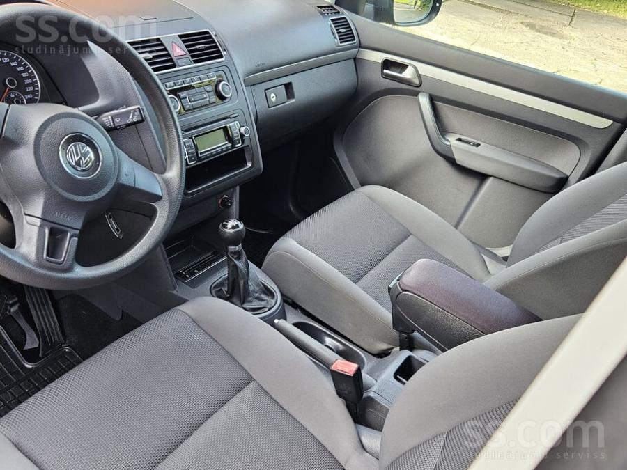 Grey Volkswagen Touran 2011 in Jekabpils, with an engine capacity of 1.60 L and mileage of 280 thousand km for 6490 €, photo 11 on AUTOMOTO.COM.LV