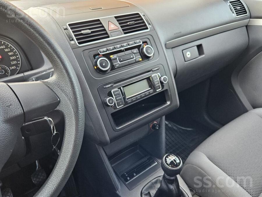 Grey Volkswagen Touran 2011 in Jekabpils, with an engine capacity of 1.60 L and mileage of 280 thousand km for 6490 €, photo 26 on AUTOMOTO.COM.LV