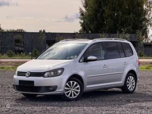 Grey Volkswagen Touran 2011 in Taurage, with an engine capacity of 1.97 L and mileage of 300 thousand km for 5990 €, photo  on AUTOMOTO.COM.LV