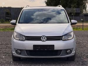 Grey Volkswagen Touran 2011 in Taurage, with an engine capacity of 1.97 L and mileage of 300 thousand km for 5990 €, photo 4 on AUTOMOTO.COM.LV