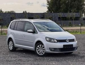 Grey Volkswagen Touran 2011 in Taurage, with an engine capacity of 1.97 L and mileage of 300 thousand km for 5990 €, photo 5 on AUTOMOTO.COM.LV