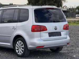 Grey Volkswagen Touran 2011 in Taurage, with an engine capacity of 1.97 L and mileage of 300 thousand km for 5990 €, photo 8 on AUTOMOTO.COM.LV