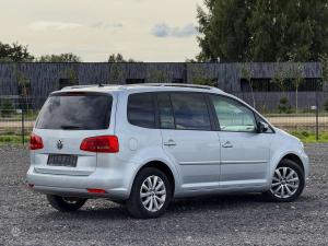 Grey Volkswagen Touran 2011 in Taurage, with an engine capacity of 1.97 L and mileage of 300 thousand km for 5990 €, photo 9 on AUTOMOTO.COM.LV