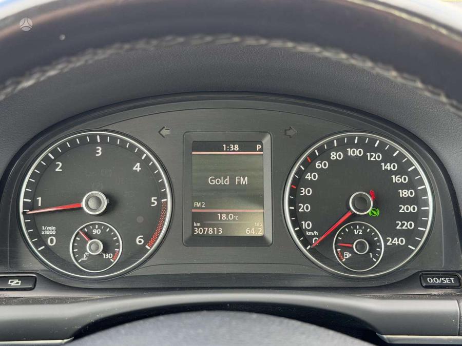 Grey Volkswagen Touran 2011 in Taurage, with an engine capacity of 1.97 L and mileage of 300 thousand km for 5990 €, photo 16 on AUTOMOTO.COM.LV
