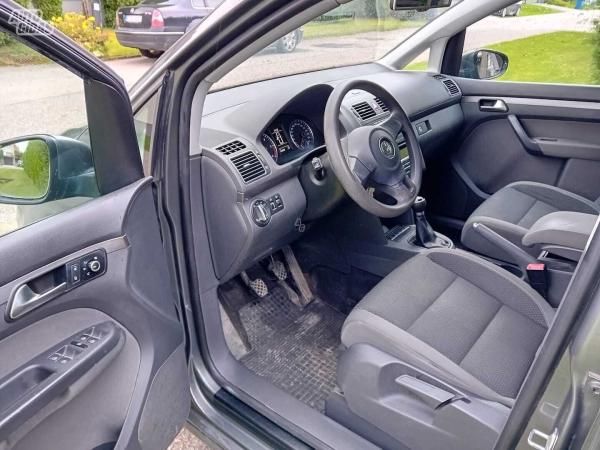 Grey Volkswagen Touran 2011 in Siauliai, with an engine capacity of 2.00 L and mileage of 332 thousand km for 5400 €, photo 10 on AUTOMOTO.COM.LV