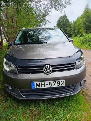 Grey Volkswagen Touran 2011 in Liepaja, with an engine capacity of 2.00 L and mileage of 300 thousand km for 5800 €, photo  on AUTOMOTO.COM.LV