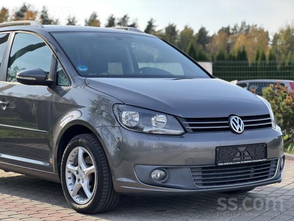 Grey Volkswagen Touran 2011 in Cesis, with an engine capacity of 1.40 L and mileage of 149 thousand km for 6950 €, photo 1 on AUTOMOTO.COM.LV
