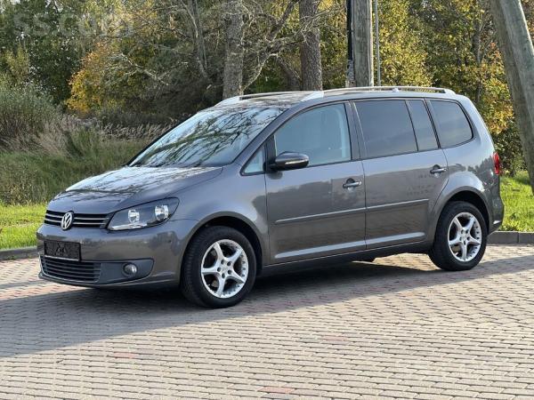 Grey Volkswagen Touran 2011 in Cesis, with an engine capacity of 1.40 L and mileage of 149 thousand km for 6950 €, photo 3 on AUTOMOTO.COM.LV